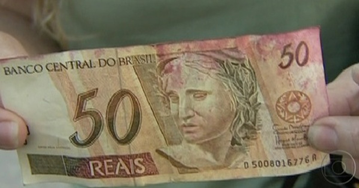 Jornal Hoje - Cédulas manchadas com tinta rosa estão circulando no ...