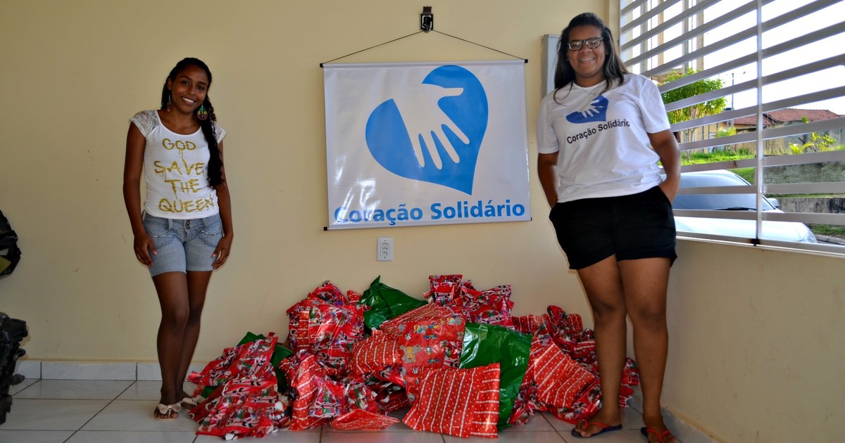 G1 - Voluntários arrecadam doações para festa de Natal em comunidade ...