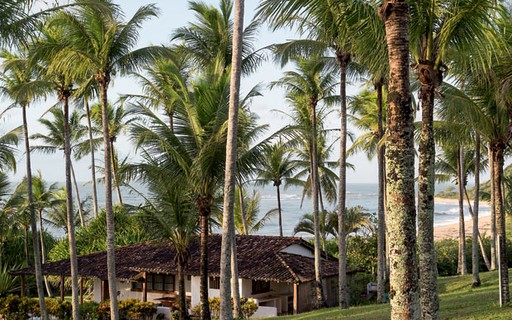 Casa de praia rústica tem ambientes integrados e madeira - Casa e ...