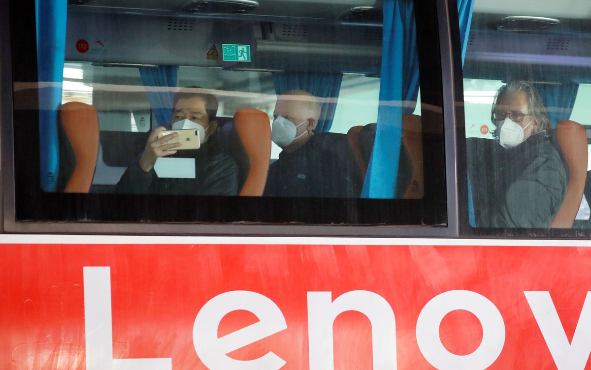 Especialistas da OMS chegam a Wuhan para estudar origem do coronavírus ...