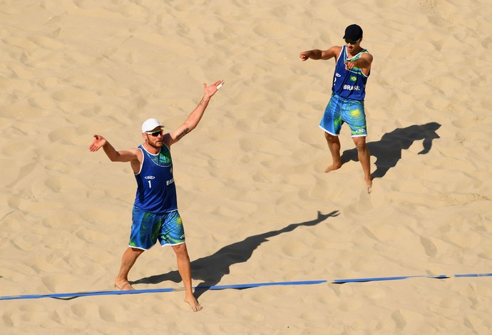 Alison/Bruno sofre com o vento, mas vence o Canadá na estreia dos Jogos