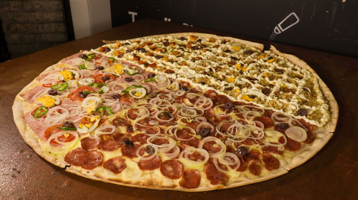 Criadora da Pizza gigante, pizzaria continua chamando atenção em Juiz ...